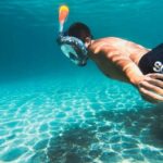 Golfo Aranci: Sunset Dolphin Kayak Tour with Aperitif - Snorkeling and Marine Encounters