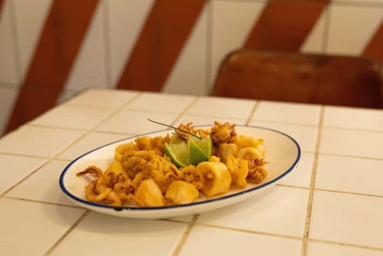 Gourmet Tapas: Local Tasting Menu at a Hidden Restaurant in Barcelona - The Wine Pairing and Ambiance