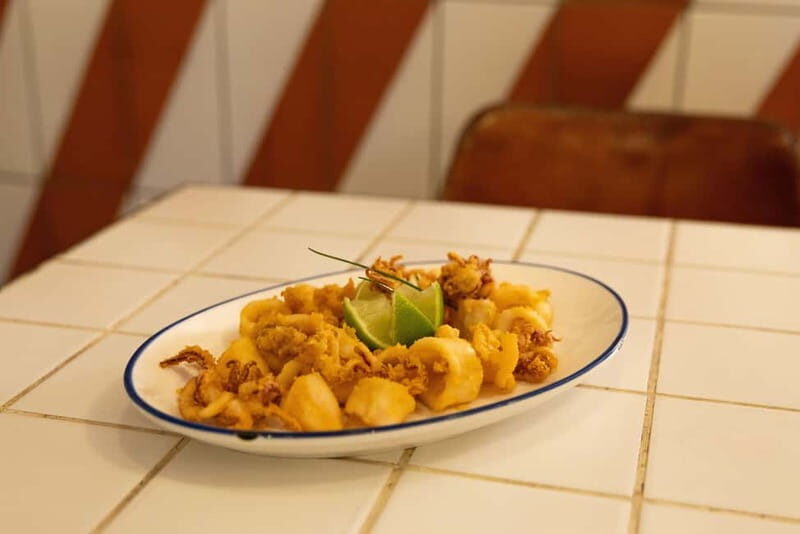 Gourmet Tapas: Local Tasting Menu at a Hidden Restaurant in Barcelona - The Wine Pairing and Ambiance