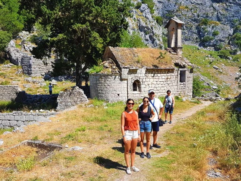 Hiking downhill Krstac to Kotor, visit San Giovanni fortress - Hiking Down the Serpentine Path: A Mix of Forest and Open Views