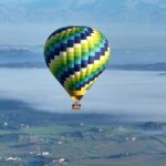 Hot air balloon over the hills of Pienza, Montalcino and Val D'Orcia - The Sum Up
