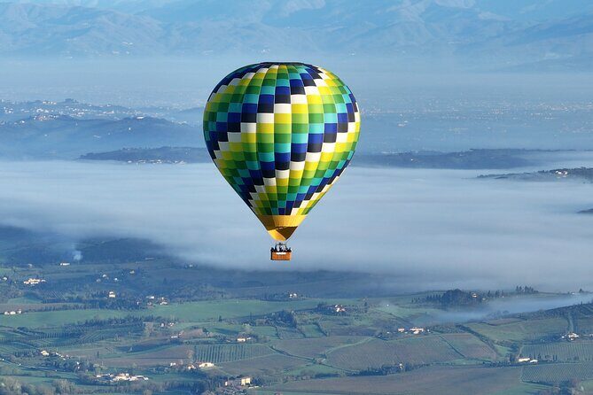 Hot air balloon over the hills of Pienza, Montalcino and Val D'Orcia - The Sum Up