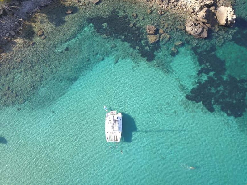 IBIZA: CATAMARAN CUEVAS CALA BASSA AND PLAYA CALA CONTE SUP PADDLE&SNORKEL - An In-Depth Look at the Ibiza Catamaran Tour