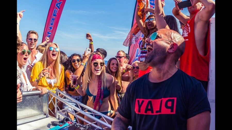 Ibiza: Ocean Club Boat Party with Premium Drinks, Food, & DJ - The Swim Stop: A High Point