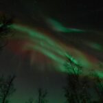 Ii: Snowmobile sleigh trip on frozen sea under starlit sky - How Does the Experience Reflect its Value?