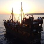 Lampedusa: Sunset Dolphin Sighting on a Pirate Ship - Practical Details and Value