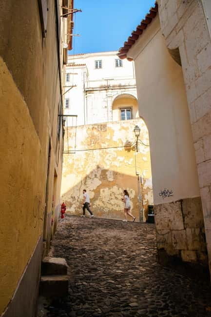 Lisbon: Alfama, Mouraria Walking Tour with Fado Night, Tapas - Who Should Consider This Tour?
