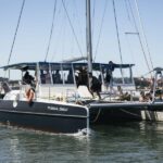 Lisbon: Catamaran Boat Party with Music, Open Bar & Dives - Key Points