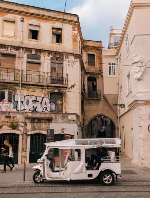 Lisbon: Private Tuk Tuk Tour with Professional Guide - Getting a View: Lisbon Cathedral and Portas do Sol Terrace
