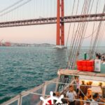 Lisbon: Sunset Boat Party with 2 Drinks and Free Club Entry - Sunset Views and Scenic Sights