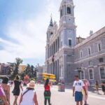 Madrid Essential Walking Tour with Churros, Drink & Market - The Charm of Loops & Landmarks