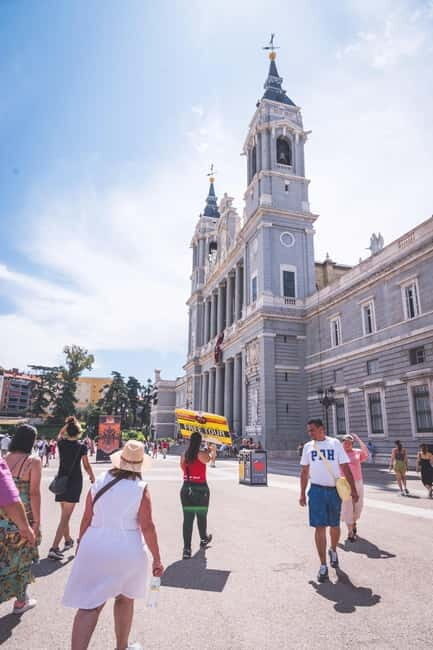 Madrid Essential Walking Tour with Churros, Drink & Market - The Charm of Loops & Landmarks