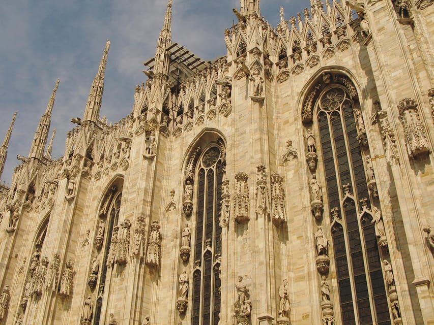 Milan: Duomo Cathedral Entry Ticket and Rooftop Tour - Discovering the Heart of Milan: The Duomo Inside and Out