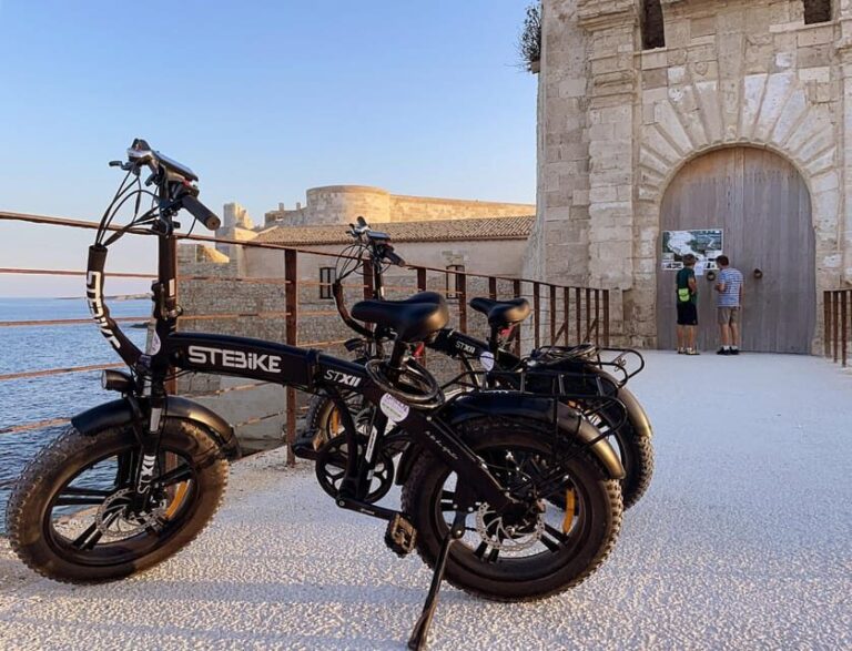 Ortigia E-bike tour and aperitif at sunset - The Sum Up