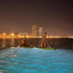 Paddle surf at night with light & drink -photos &videos - Why This Activity Stands Out