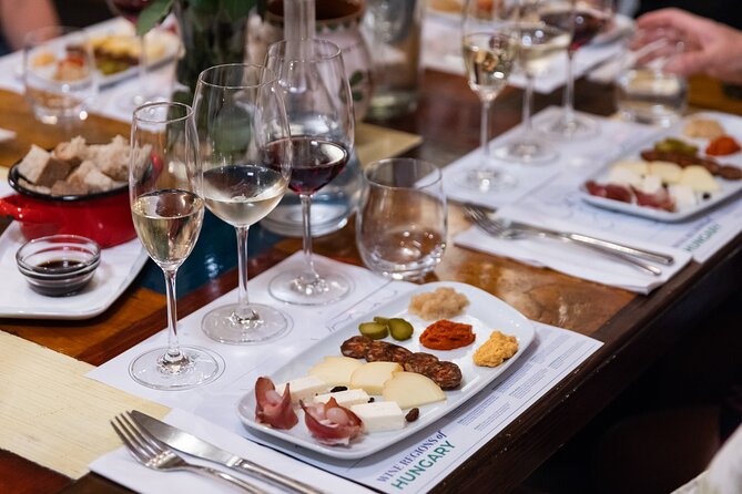 Palace District Evening Culinary, Wine, and History Walk - Key Points: