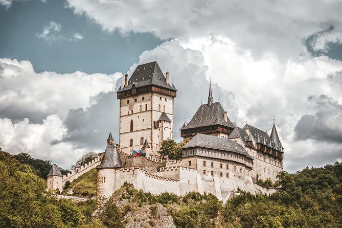 Private Karlstejn Castle luxury tour from Prague with Caves - Detailed Breakdown of the Itinerary