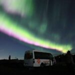 Reykjavik: Northern Lights Group Tour with Photos - Transportation, Timing, and Group Size