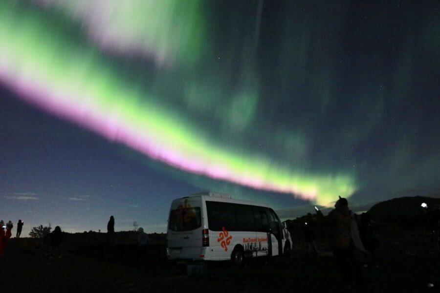 Reykjavik: Northern Lights Group Tour with Photos - Transportation, Timing, and Group Size