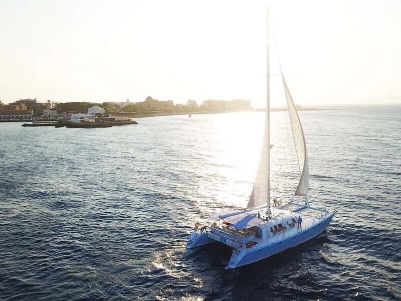 Rhodes: Catamaran Cruise with Meal, Snacks & Swim Stops - What the Experience Feels Like