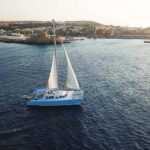 Rhodes: Catamaran Cruise with Snacks, Wine & Sunset Viewing - Deep Dive into the Itinerary