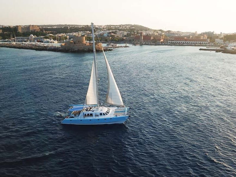 Rhodes: Catamaran Cruise with Snacks, Wine & Sunset Viewing - Deep Dive into the Itinerary