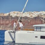 Santorini: Day Luxury Catamaran Cruise with Meal & Drinks - Key Points