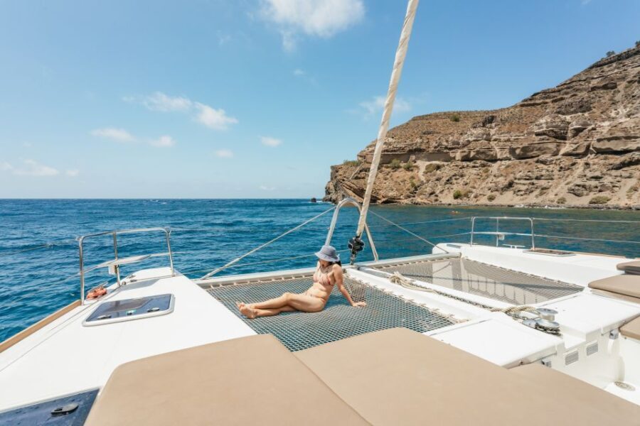 Santorini: Luxury Catamaran Day Trip with Meal and Open Bar - The Itinerary: Varied Stops with Unmatched Views