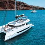 Santorini: Majestic Catamaran Cruise with Meal and Drinks - Key Points