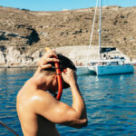 Santorini: Private Catamaran Tour with BBQ Meal and Drinks - The Itinerary: How the Day Unfolds