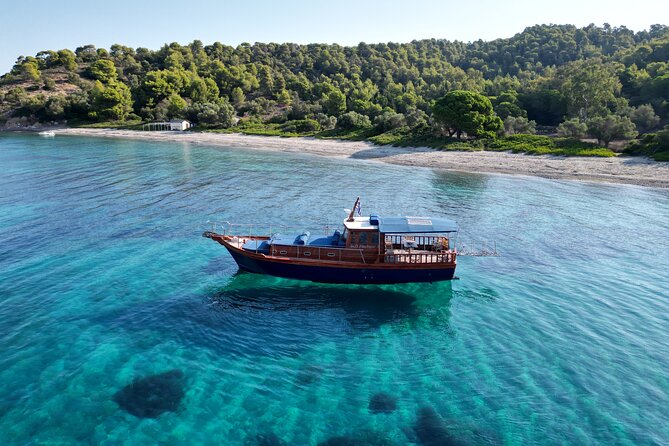 SemiPrivate Trip on 50ft Traditional Wooden Boat with Greek Lunch - Discovering the Charms of a Traditional Wooden Boat Tour in Skiathos