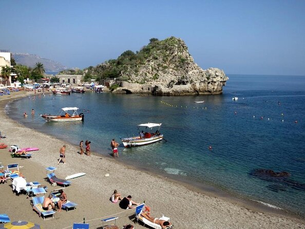 Sicilian wine tasting on the boat in Taormina - Discover Taorminas Coastline with a Sicilian Wine Tasting Boat Tour