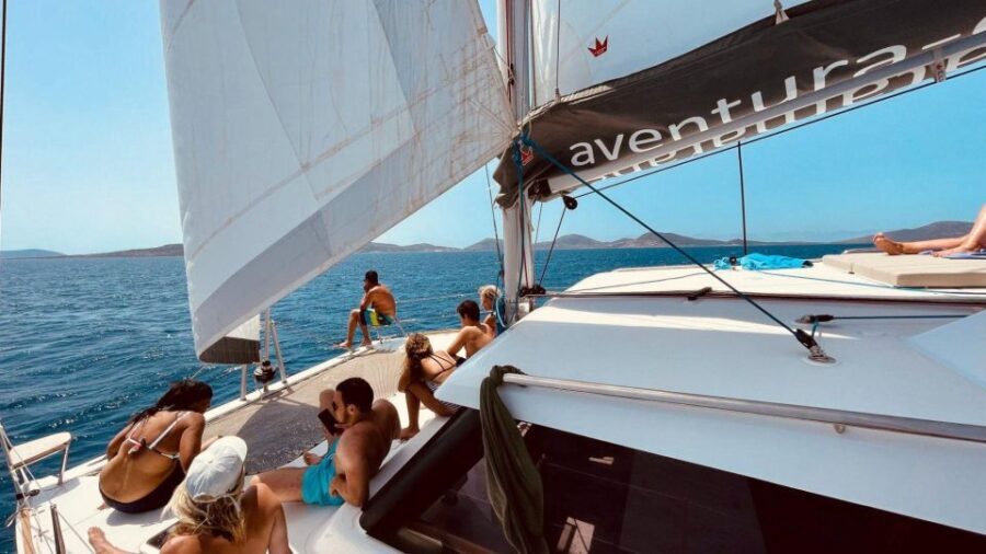 Stintino: Half-day catamaran tour to La Pelosa with aperitif - The Experience in Detail