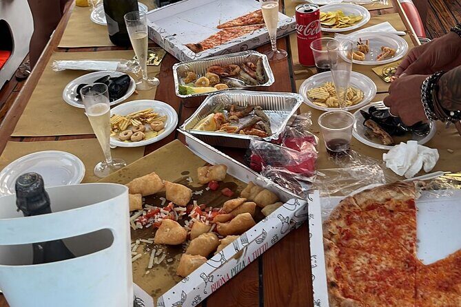 Sunset aperitif on a boat in Scilla - The Aperitif and Local Flavors