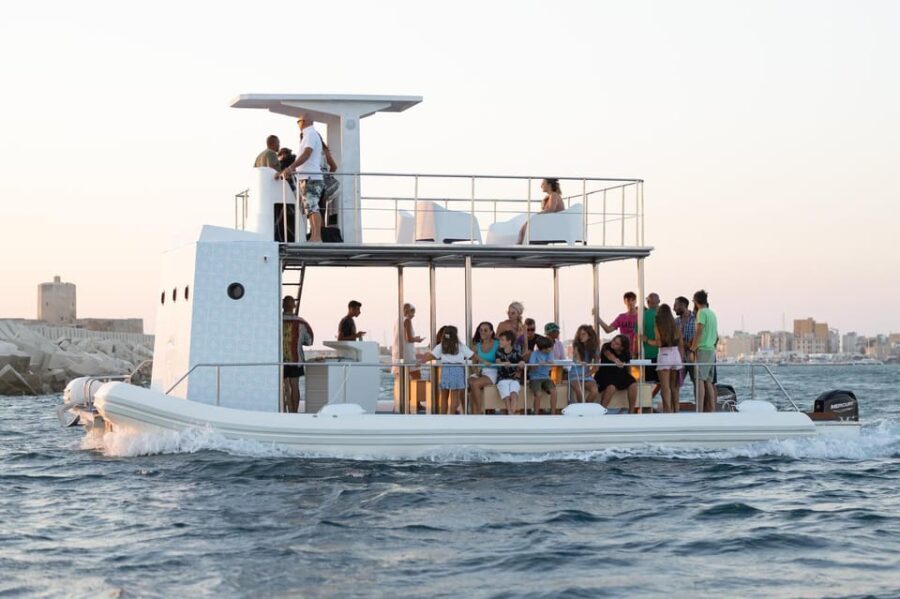 Taormina: BOAT PARTY IN CATAMARANO NELLA BAIA DI TAORMINA - Authentic Experiences and Hidden Gems