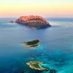 Tavolara: Sunset Aperitif Tour with Drinks and local snacks - The Itinerary in Detail: From Start to Sunset