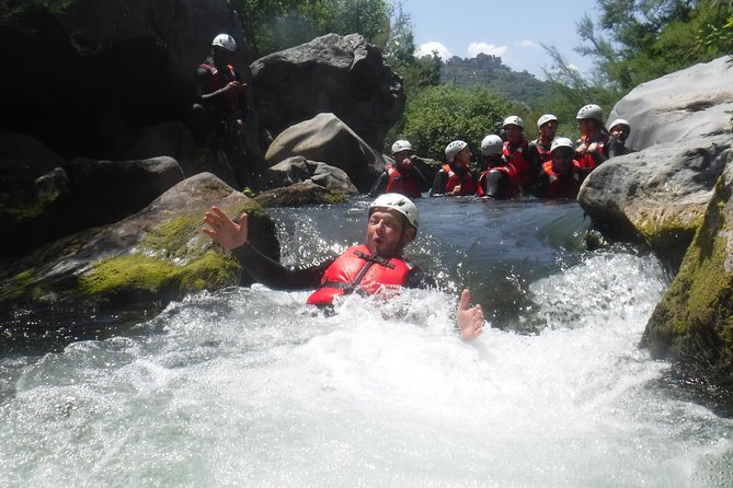 TuffAlcantara - dives, slides and lots of fun in the Alcantara river - An Authentic Splash of Sicily: A Close Look at the TuffAlcantara Canyoning Tour