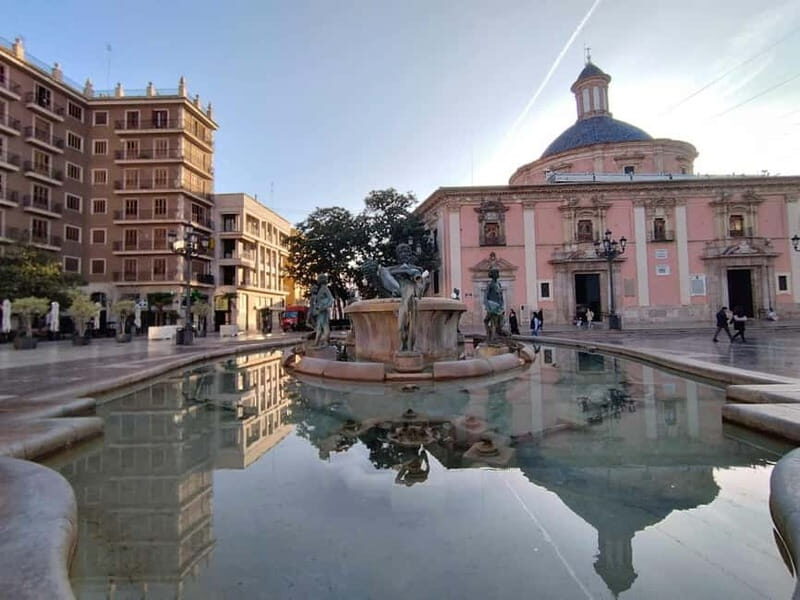 Valencia: Market Food Tour Including Tapas & Paella Tasting - Architectural Highlights and Stories