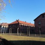 Warsaw: Tour to Krakow and Auschwitz by Train with Pickup - From Krakow Station to Auschwitz
