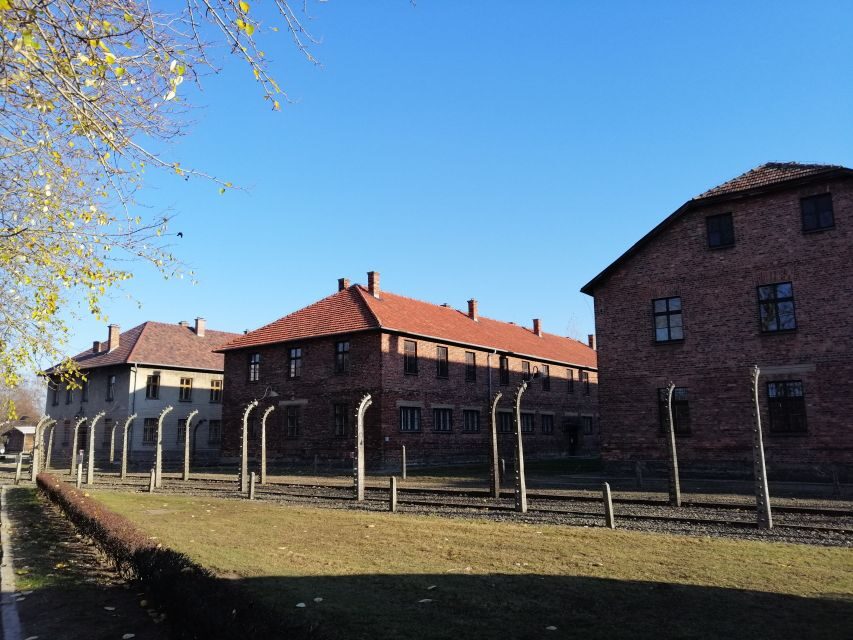 Warsaw: Tour to Krakow and Auschwitz by Train with Pickup - From Krakow Station to Auschwitz