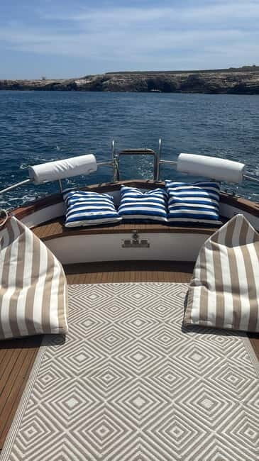 Wooden Gozzo Tour with Aperitif Towards the Beautiful Coast of Polignano - Detailed Breakdown of the Itinerary