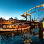 Amsterdam: Evening Canal Cruise with (Open) Bar on Board - The Itinerary in Detail