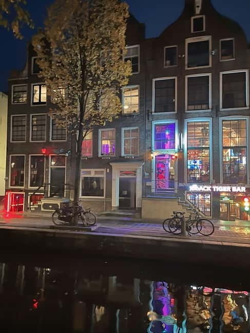 Amsterdam: Red Light District Tour in German/English for groups of 4 or more - Why This Tour Stands Out