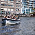 Amsterdam Revealed in Portuguese: 2 Hours of Great Exploration - Detailed Itinerary Breakdown