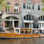 Amsterdam small-group canal cruise in 1920s saloon boat - The Itinerary: What Makes Each Stop Special