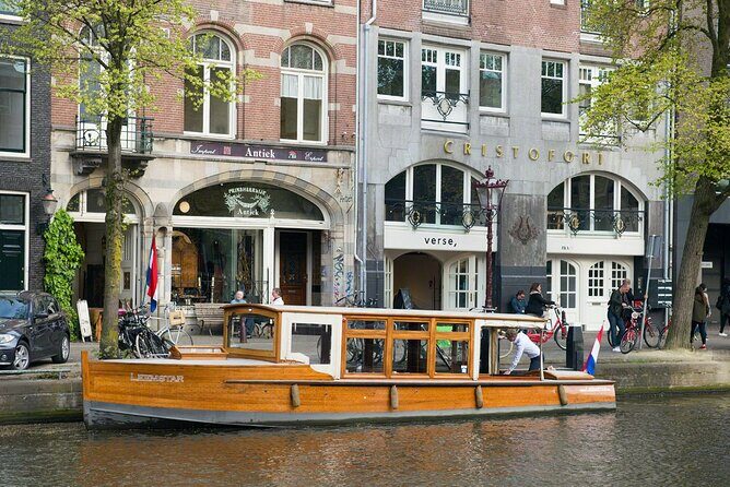 Amsterdam small-group canal cruise in 1920s saloon boat - The Itinerary: What Makes Each Stop Special
