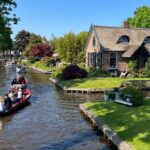 Amsterdam: Zaanse Schans and Giethoorn Guided Combo Tour - Meeting and Transportation