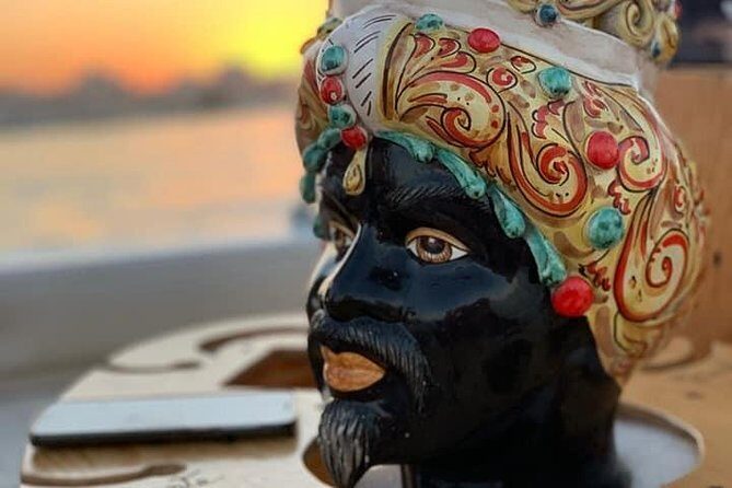 Aperitif on the boat at Sunset island and sea caves - The Detailed Itinerary