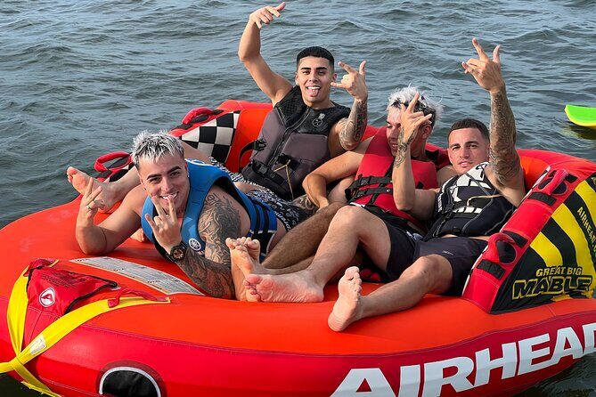 Aquatic Adventure: Boat Tour with Jetskis, Tubing, and Open Bar - Who Will Love This Tour?