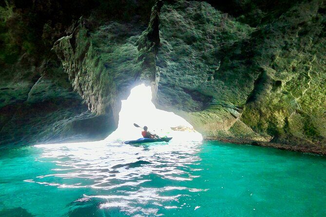 Kayak and canoe tour to Roca Vecchia and La Grotta della Poesia - Visiting the Pirate Caves and Hidden Bays